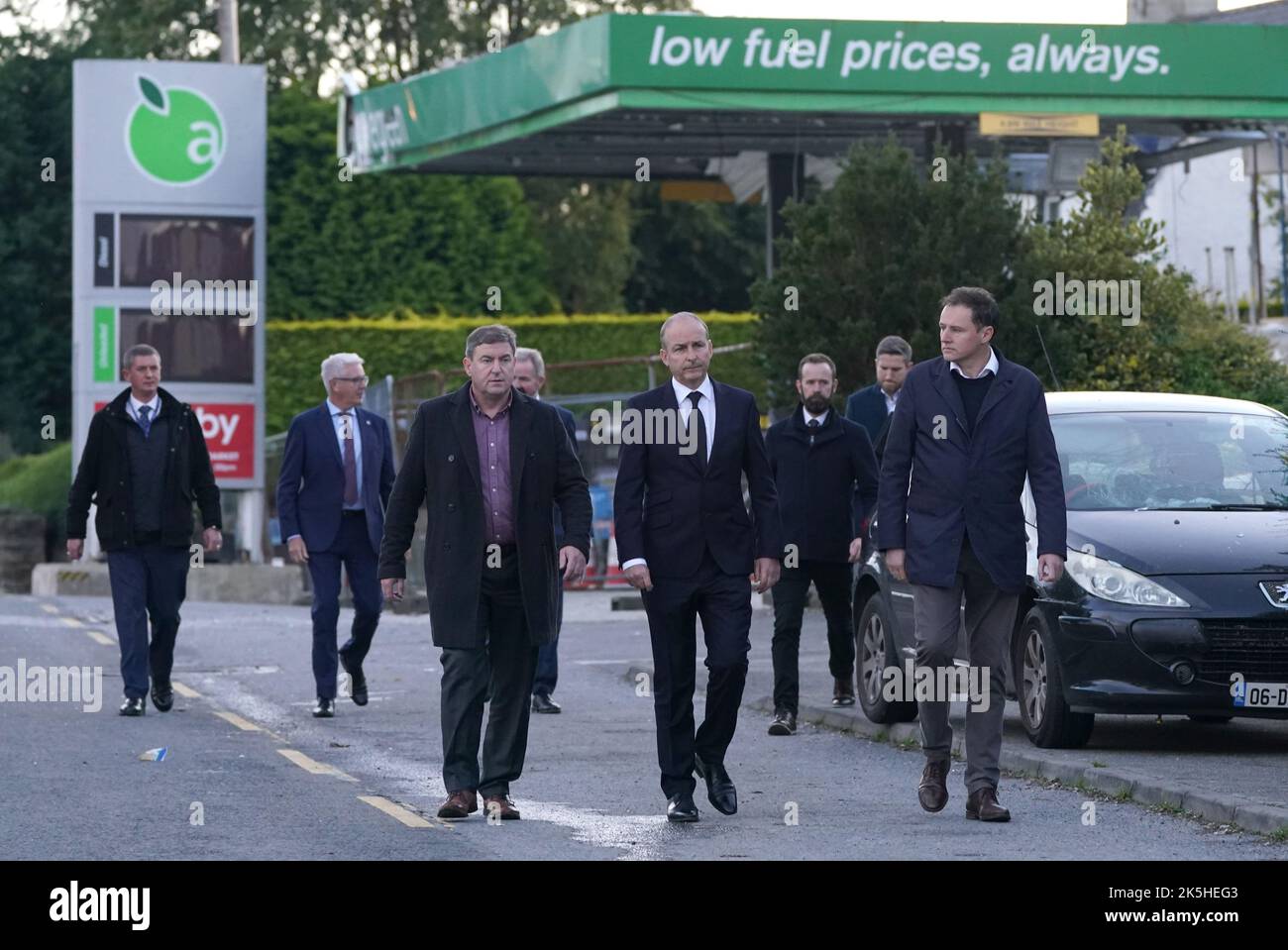 Taoiseach Micheal Martin (centre) visits the scene of an explosion at ...
