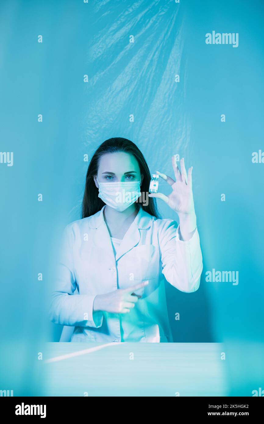 Blue vaccine hi-res stock photography and images - Alamy