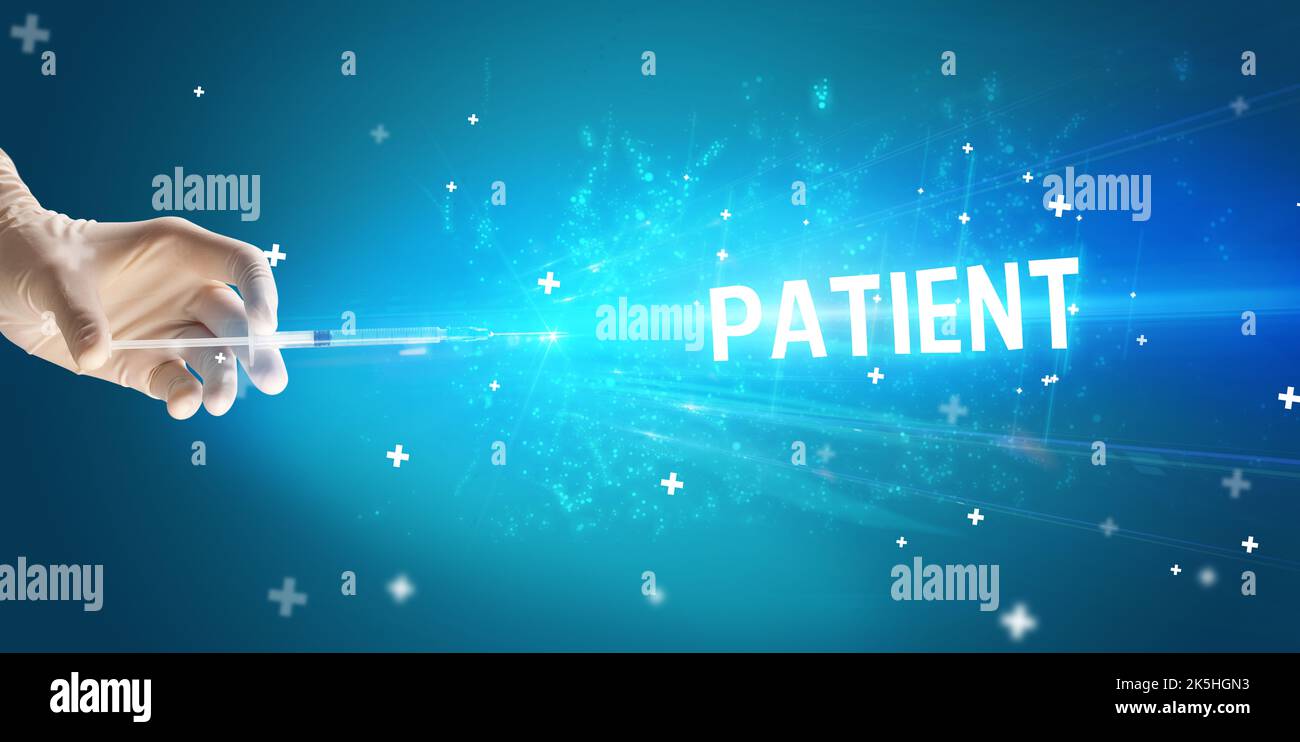 Syringe, medical injection in hand Stock Photo - Alamy