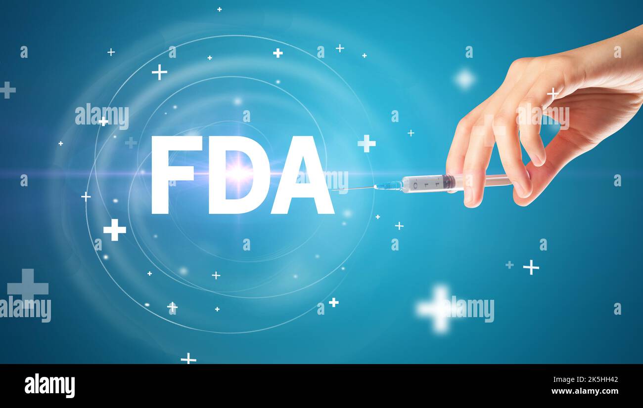 Syringe needle with virus vaccine Stock Photo - Alamy