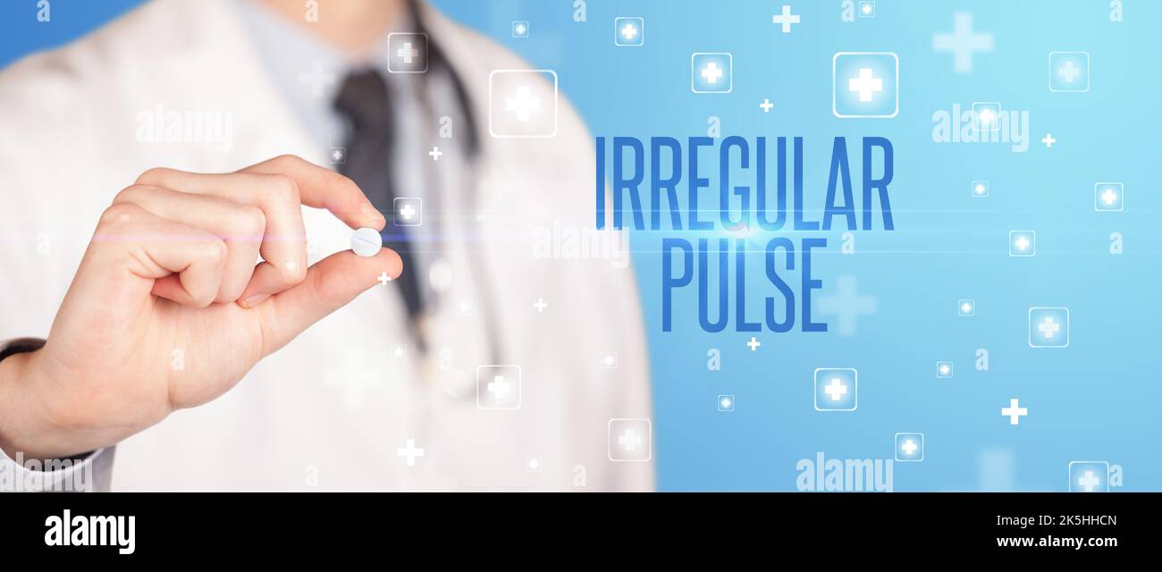 Close-up of a doctor giving a pill Stock Photo - Alamy