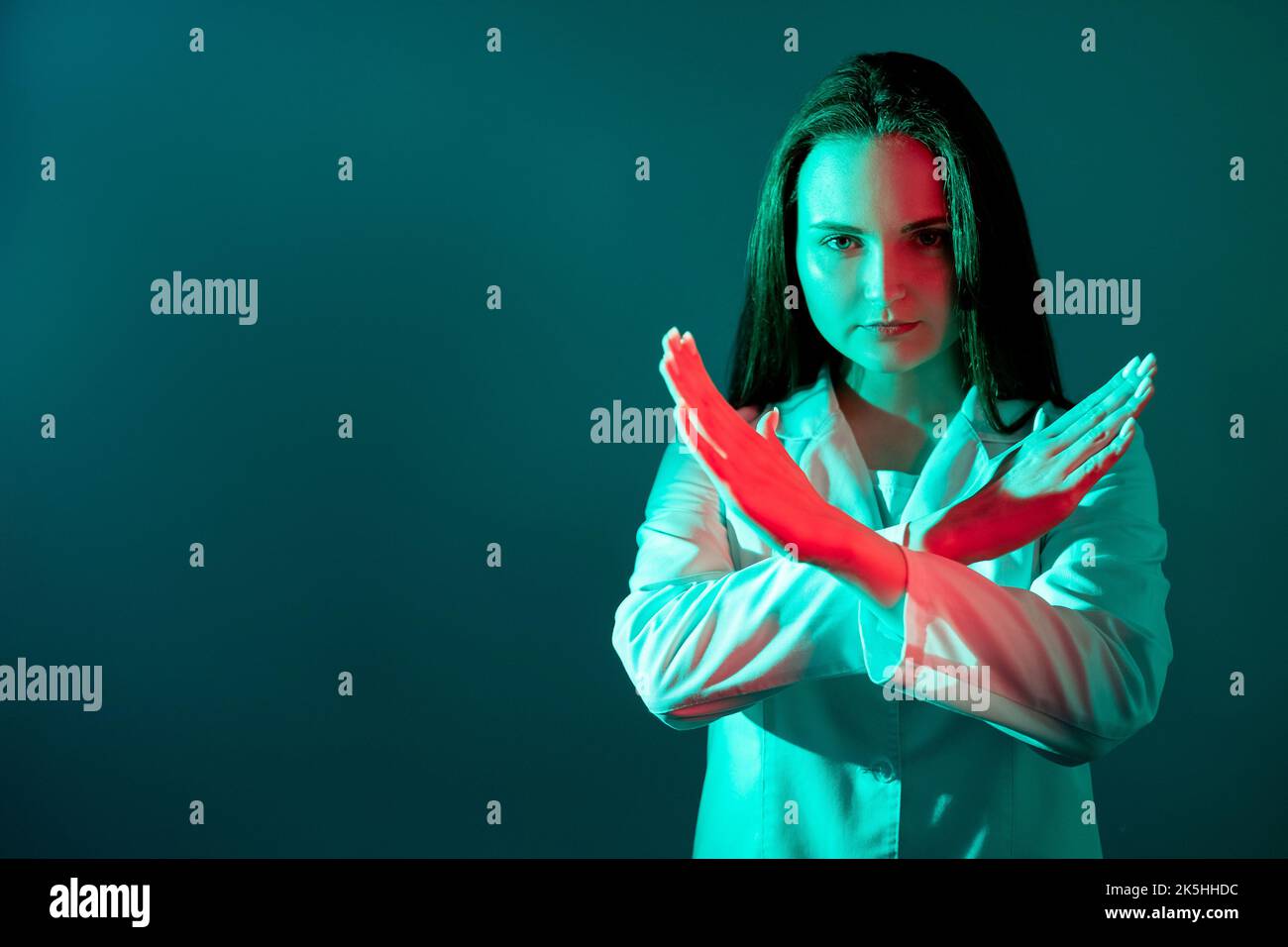 medical prohibition doctor warning with x gesture Stock Photo - Alamy