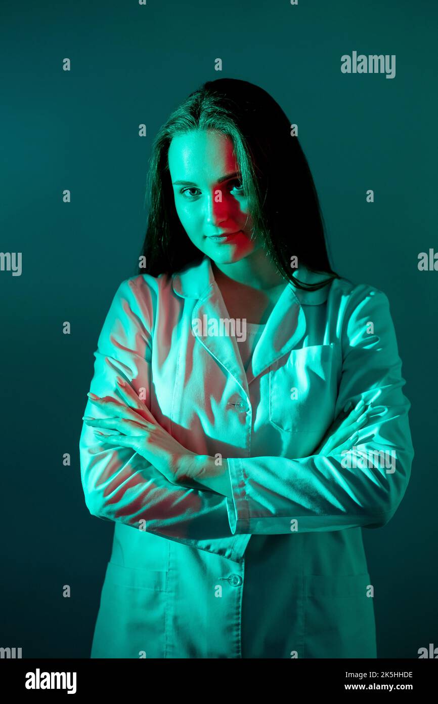 doctor portrait confident female physician on blue Stock Photo - Alamy