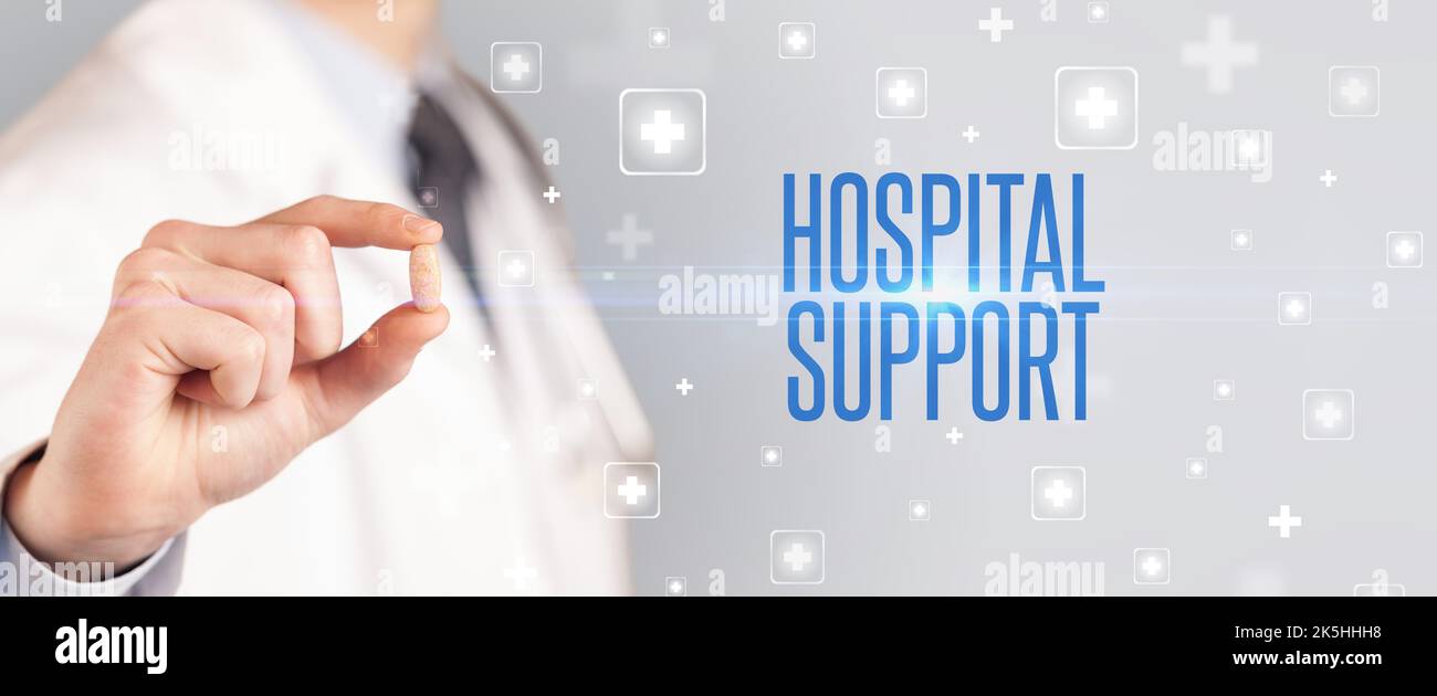 Close-up of a doctor giving a pill Stock Photo - Alamy