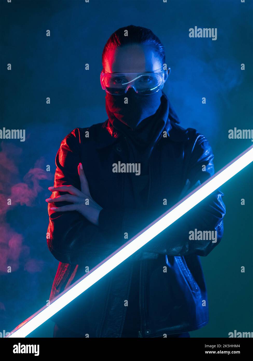 cyberpunk fashion futuristic woman in neon smoke Stock Photo - Alamy