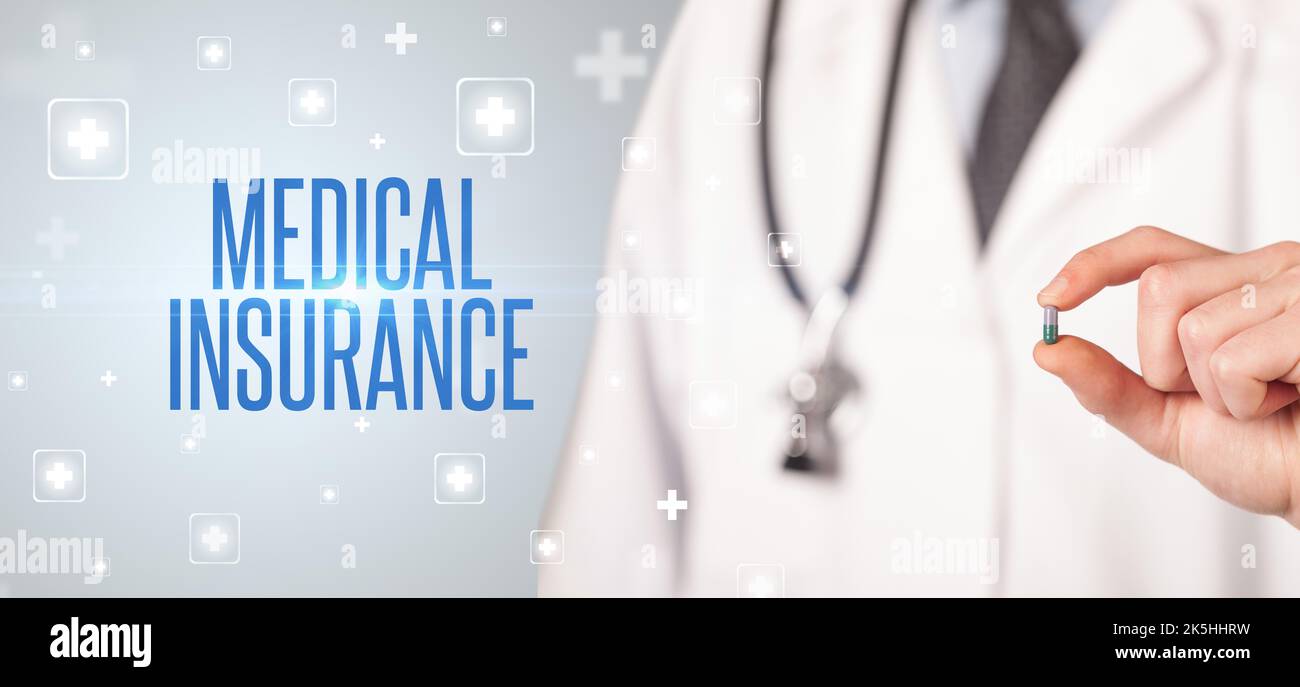 Close-up of a doctor giving a pill Stock Photo - Alamy