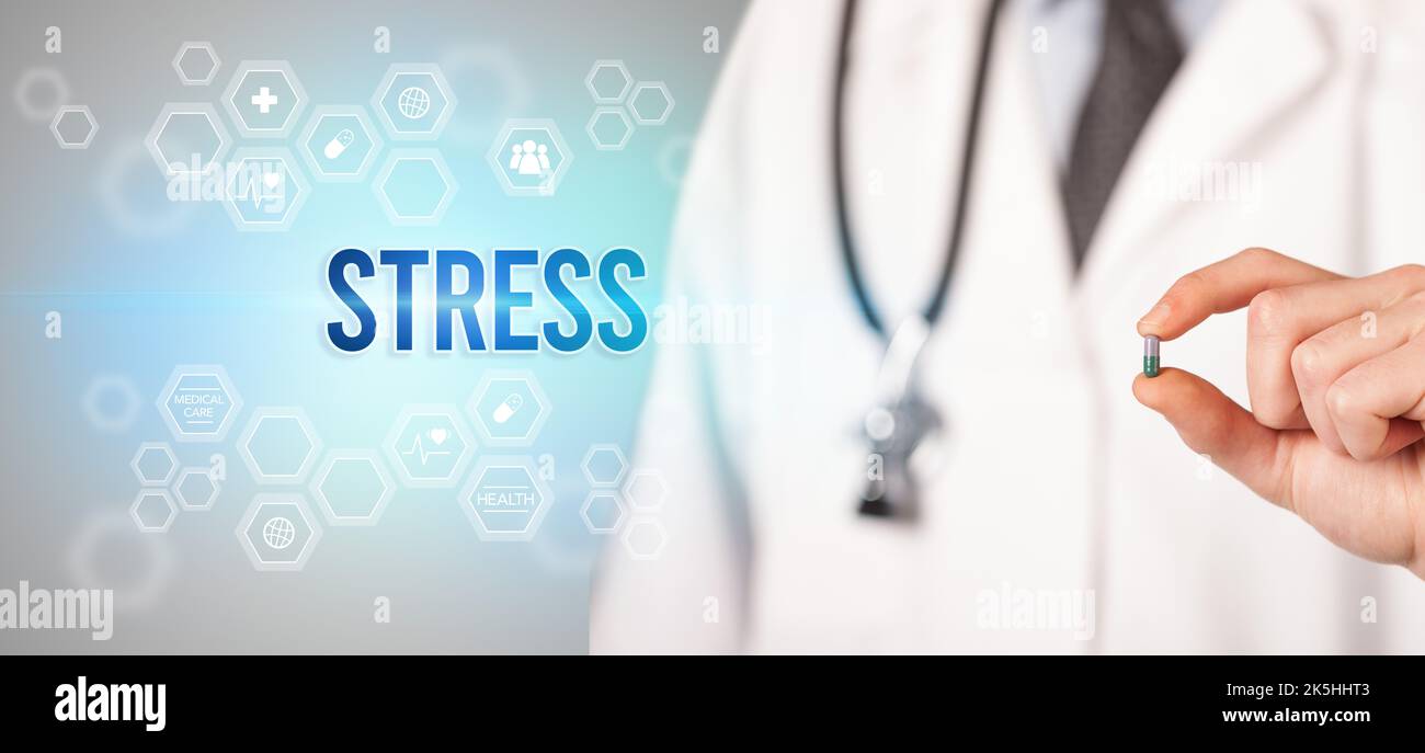 Close-up of a doctor giving you a pill Stock Photo - Alamy