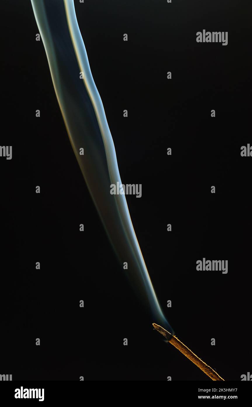 Trajectory of incense smoke in the air showing different shapes. France ...