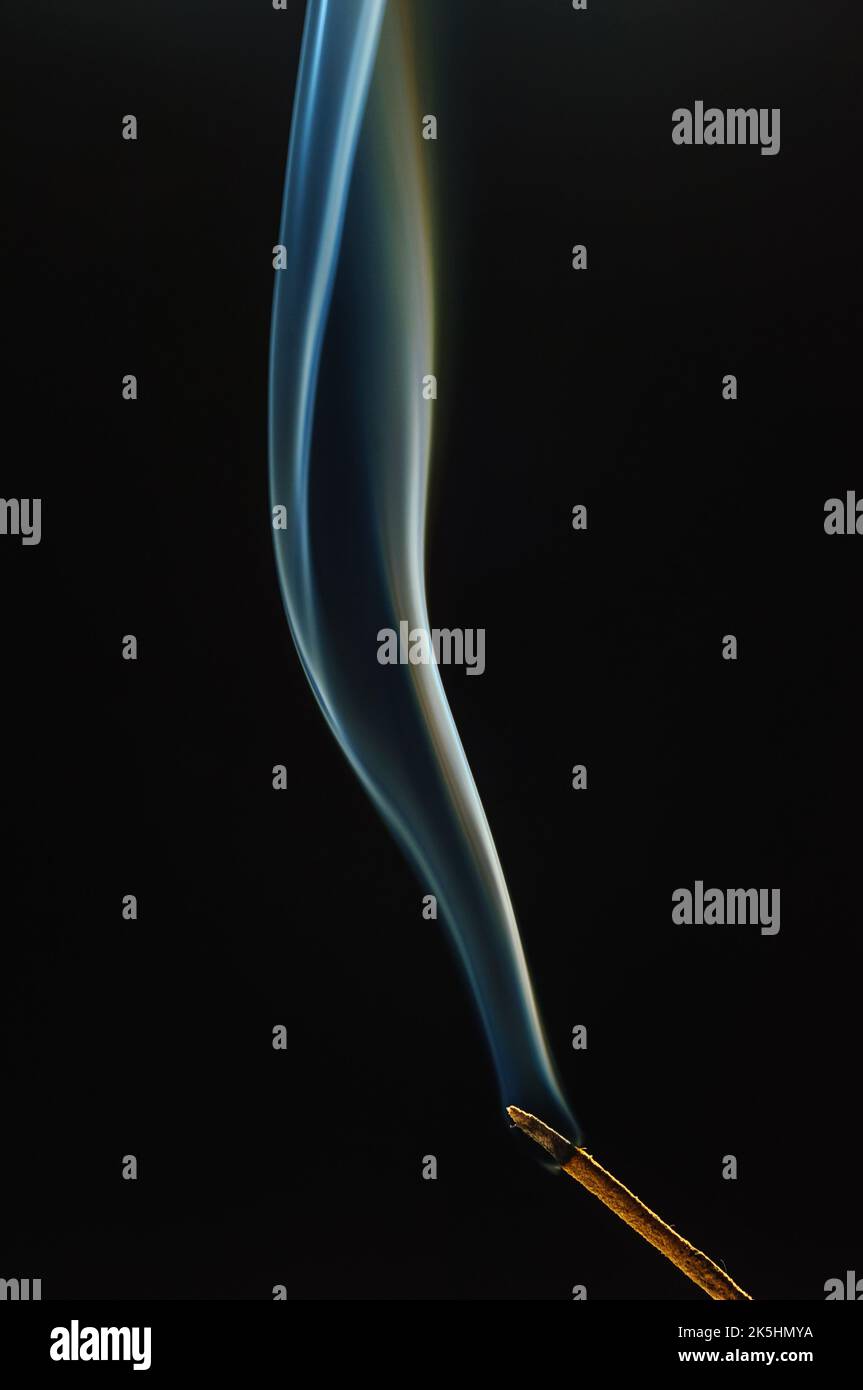 Trajectory of incense smoke in the air showing different shapes. France ...