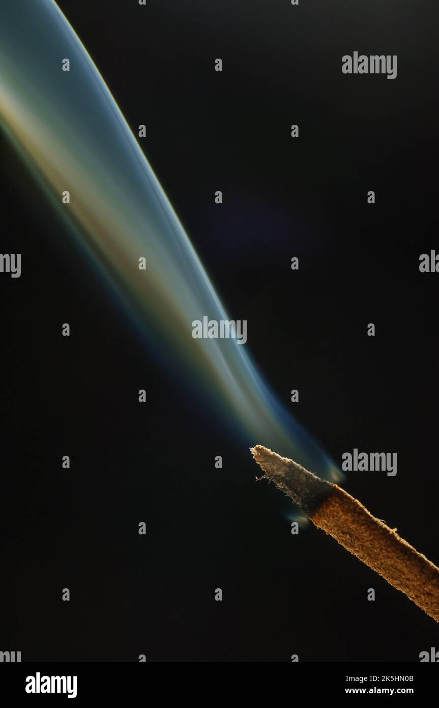 Trajectory of incense smoke in the air showing different shapes. France ...