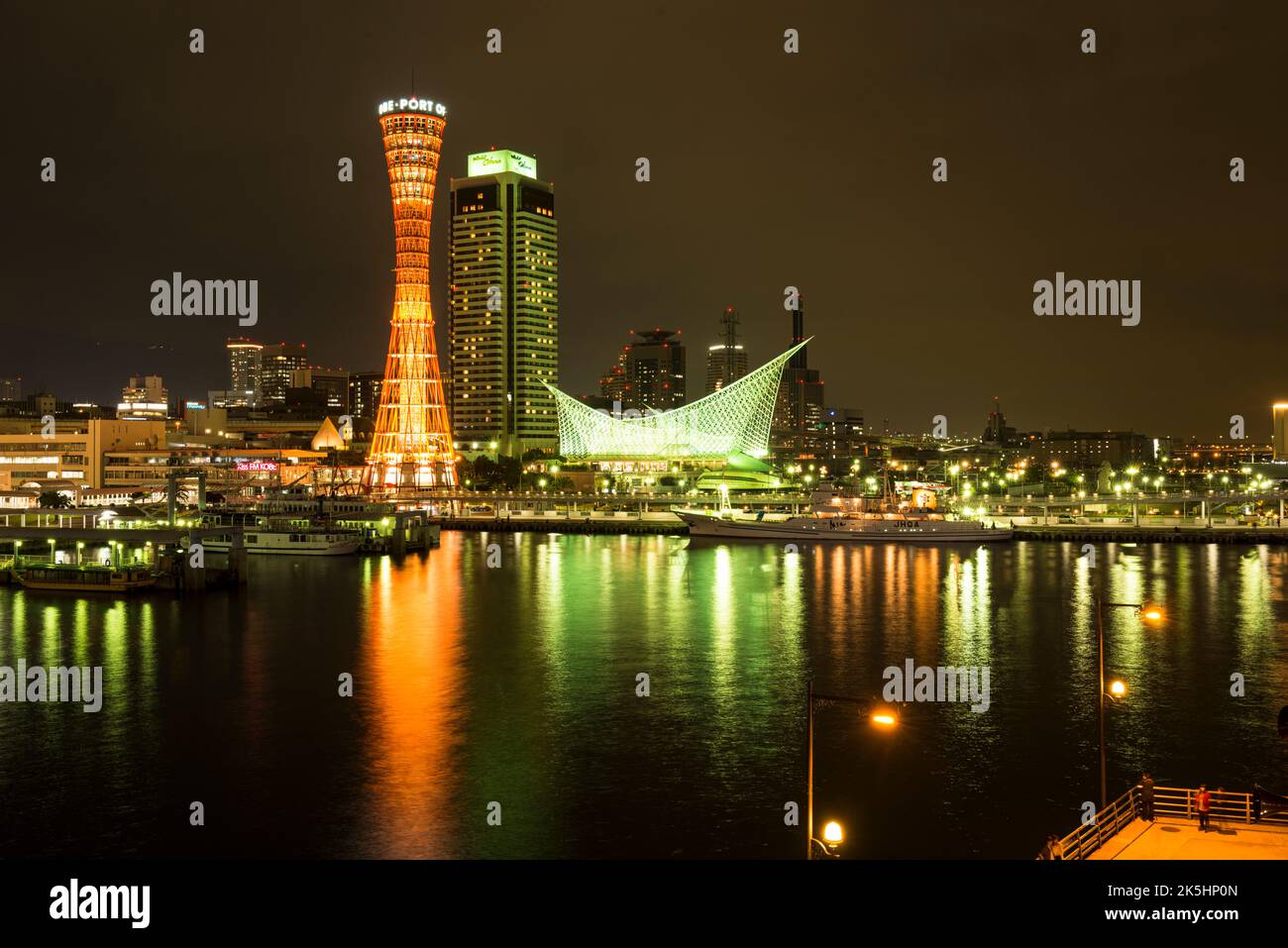 Night time shots of Kobe harbour in Kobe, Japan showing the Kobe Port ...
