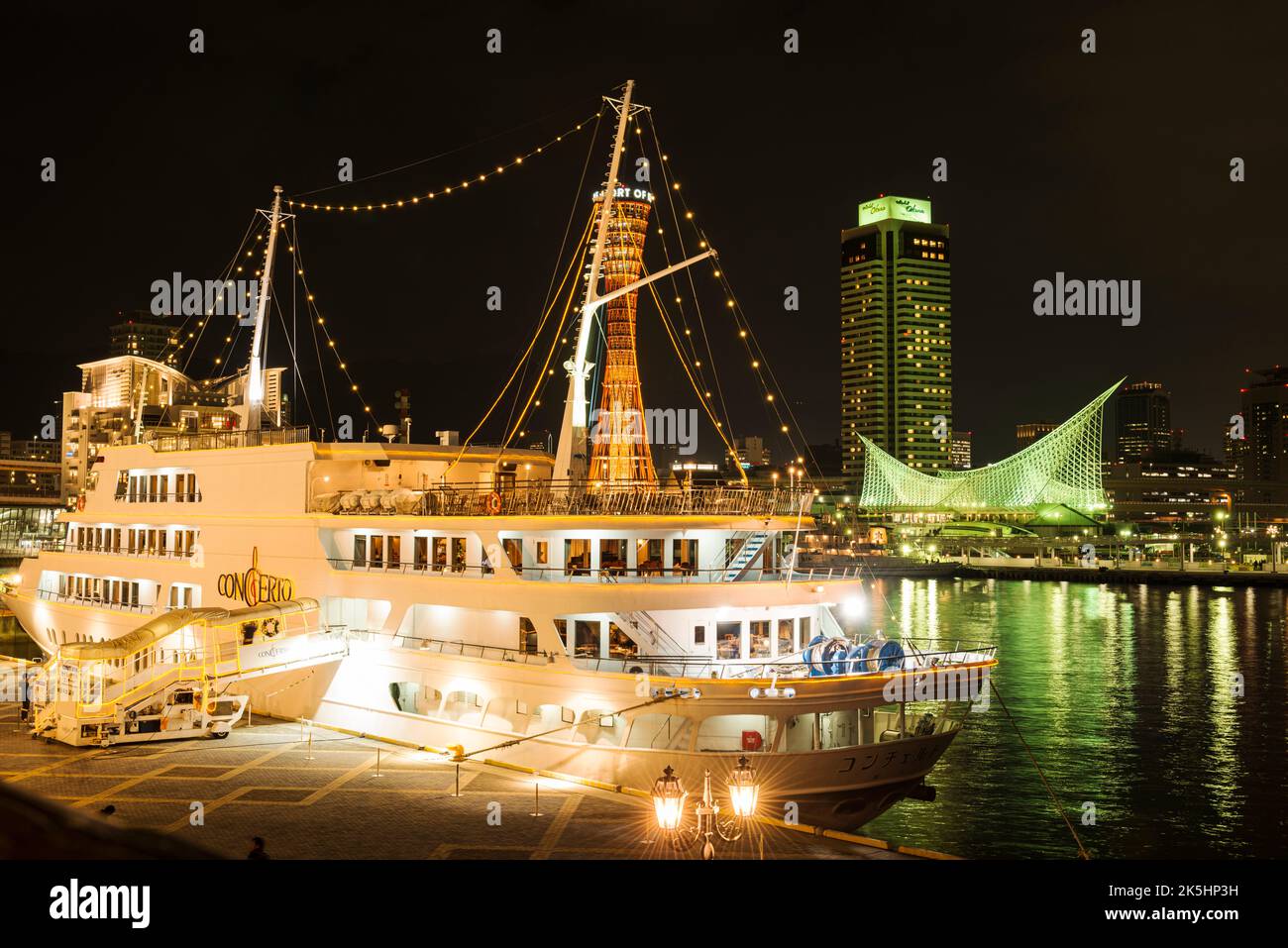 Pleasure cruising vessel, 'Concerto' at night in the harbour in Kobe ...