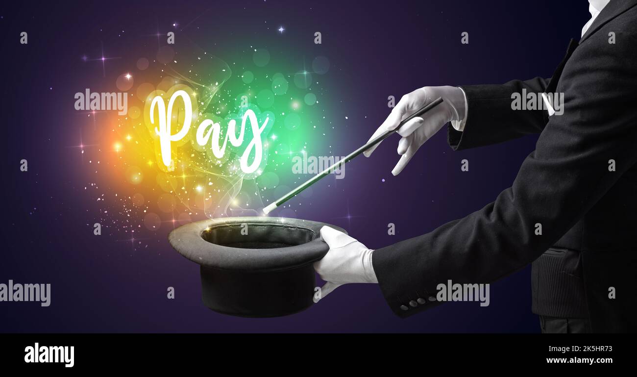 Young magician is showing magic trick Stock Photo - Alamy