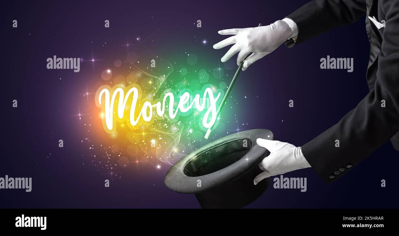 Young magician is showing magic trick Stock Photo - Alamy