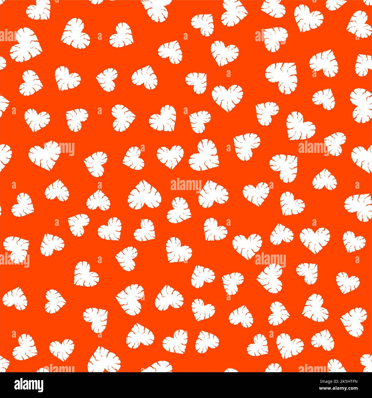 Seamless pattern with cracked hearts randomly placed on solid ...