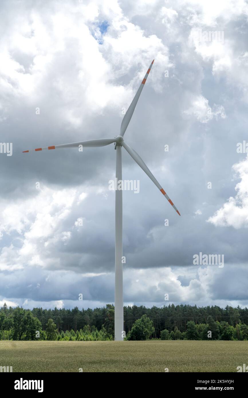 Rural landscape with wind turbine, windmill for electric power ...