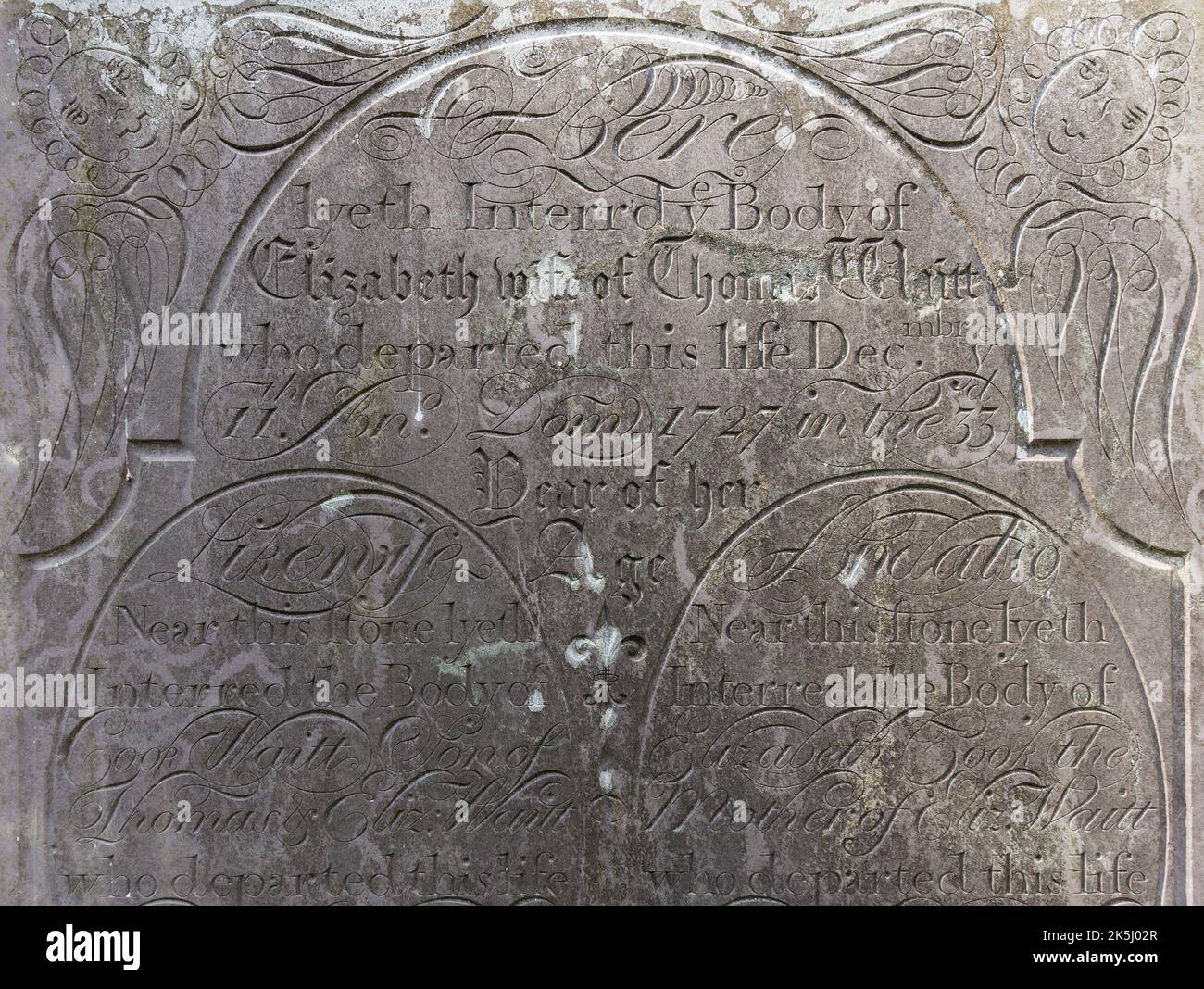 Old gravestone with ornate engraved cursive lettering, St James Church ...