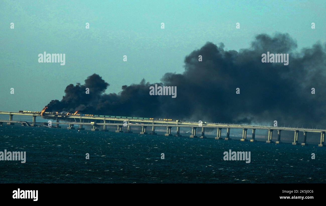 Crimea, Russia. 08th Oct, 2022. Black smoke billows from a fire on the ...