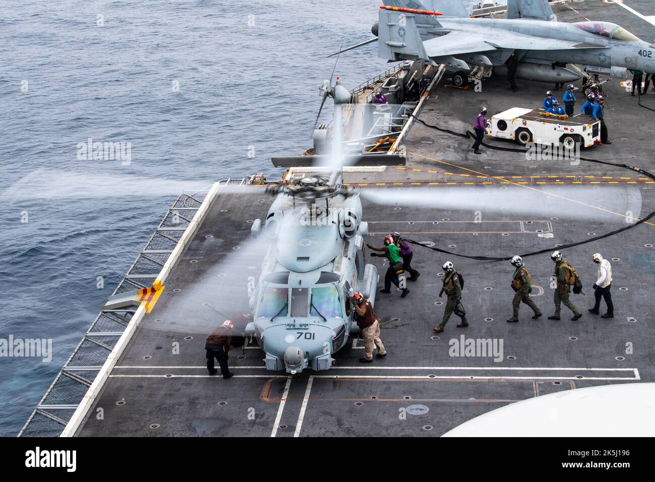 221007-N-AT895-1007 PACIFIC OCEAN (Oct. 7, 2022) U.S. Navy Sailors ...