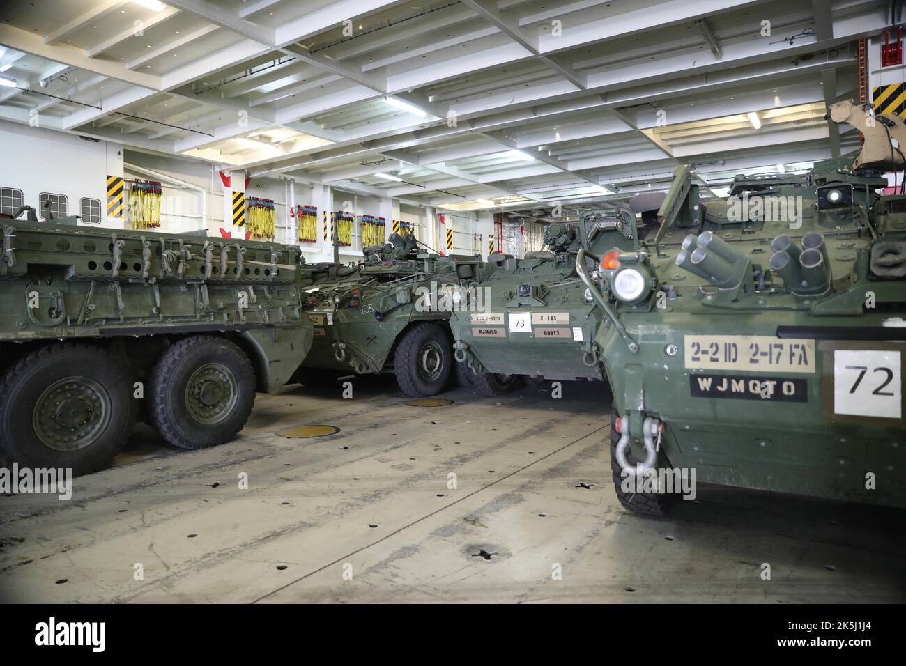 Strykers combat vehicles are staged aboard the Liberty Passion at Port ...