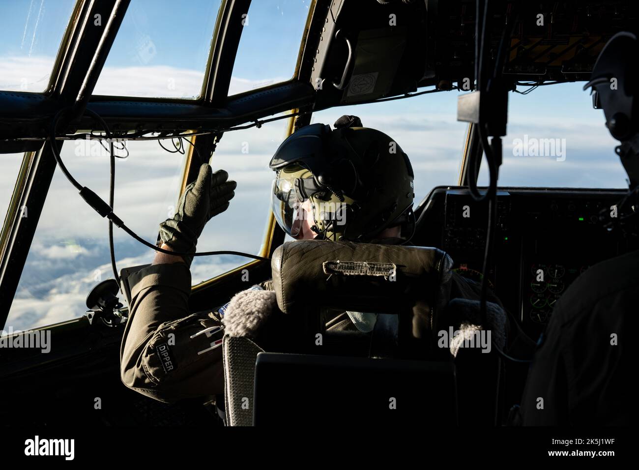 Royal New Zealand Air Force Flight Lieutenant Lachlan Newbery, a C-130H ...