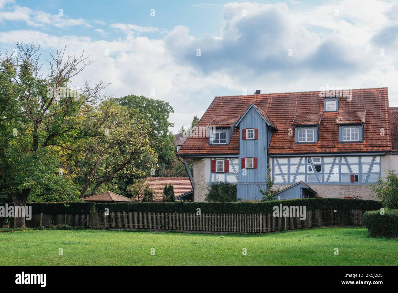 Traditional small house with beautiful outdoor decor facade in Germany ...
