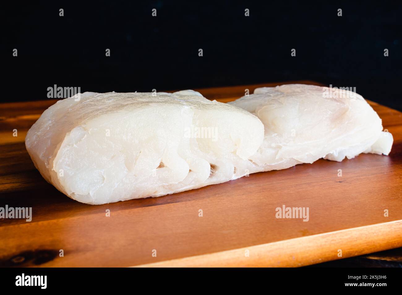 Close up Side View of a Raw Fresh Halibut Fillet: Uncooked fresh white ...