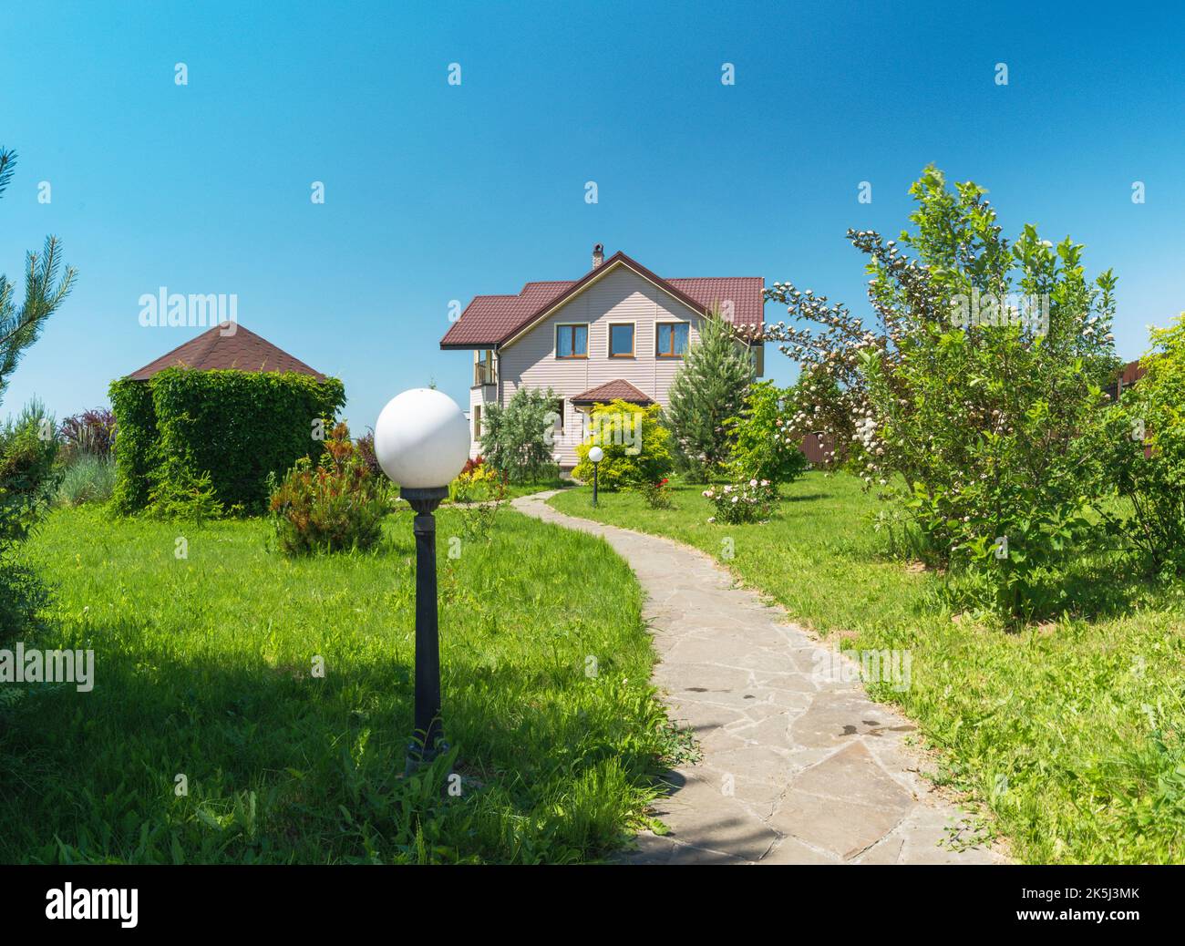 Rural landscape in countryside and Country house with tiled roof and ...