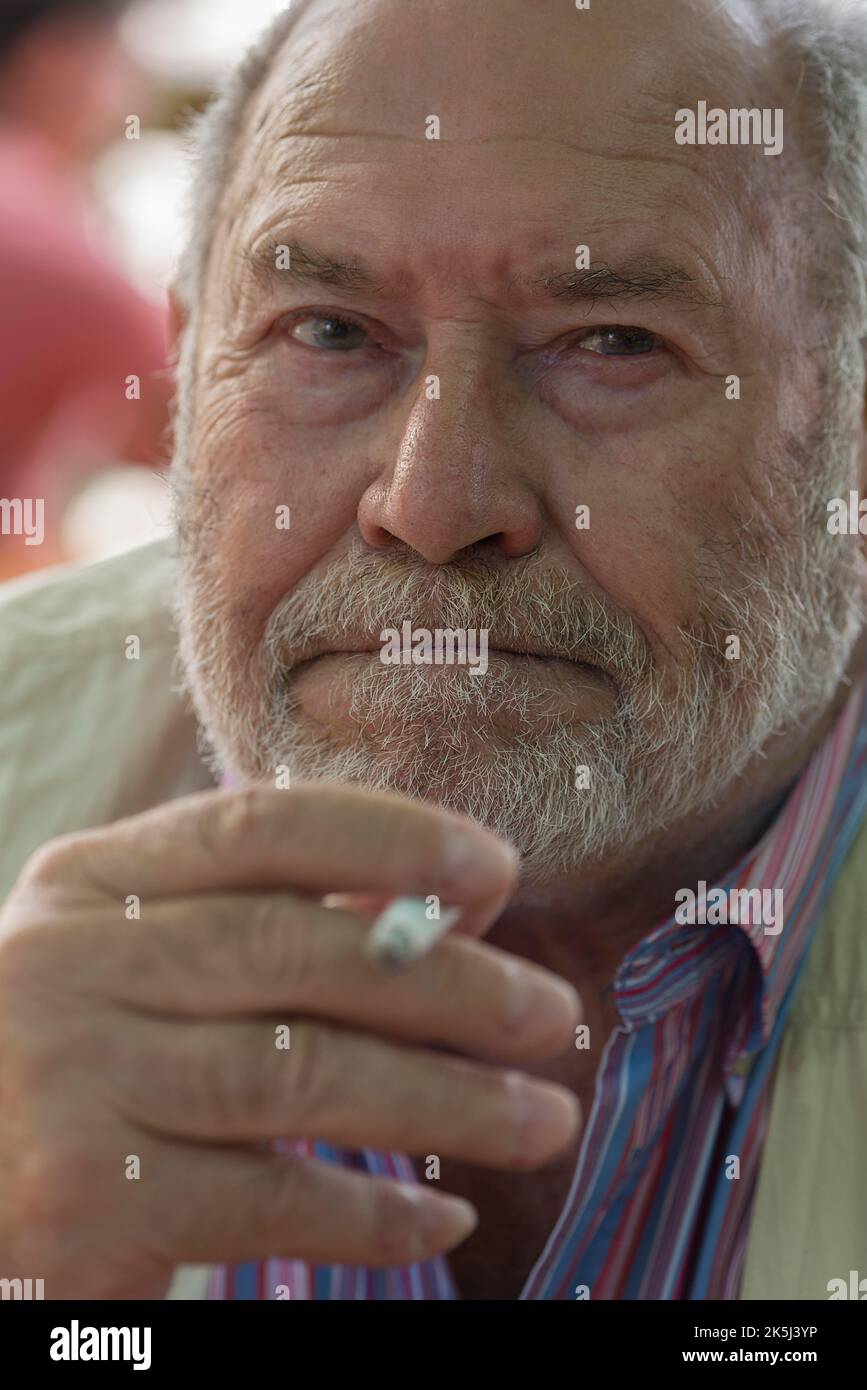 Portrait of an elderly gentleman with beard and cigarette, Bavaria ...