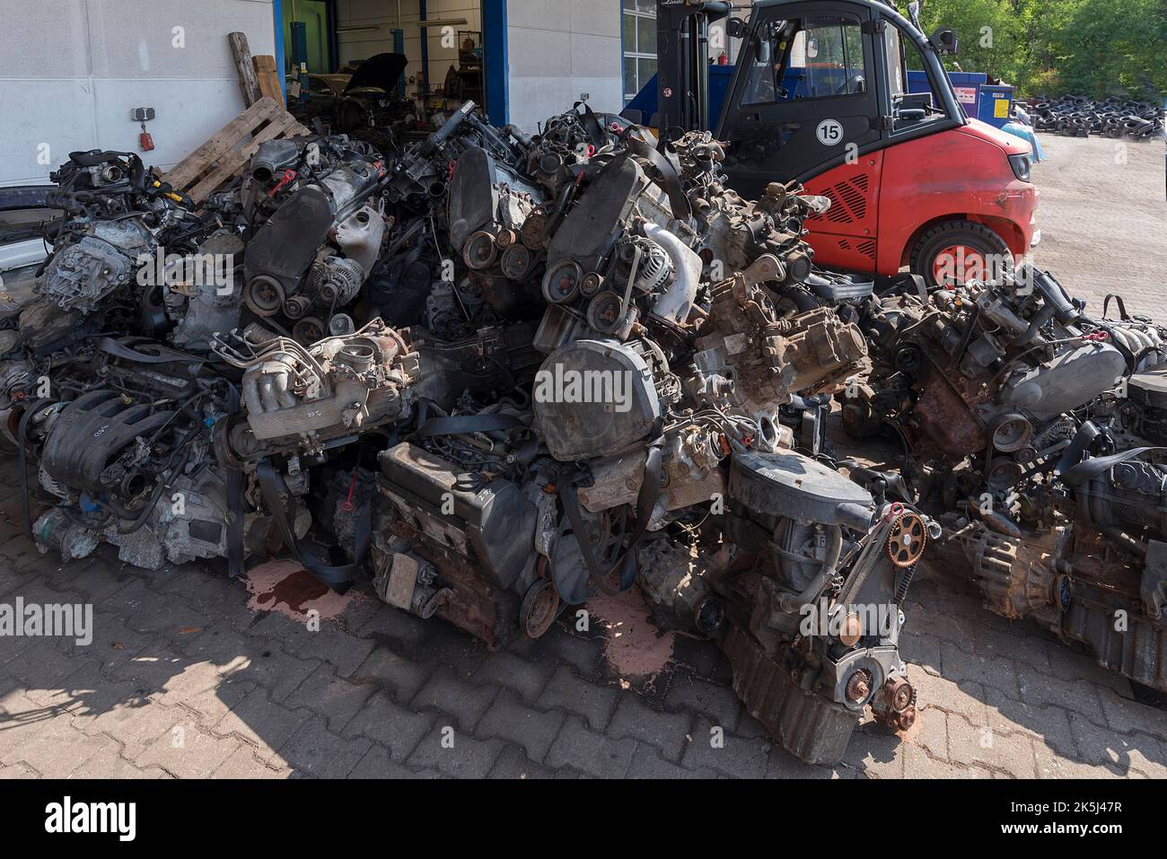 Engines in a scrap yard, collected for export to Africa, Bavaria ...
