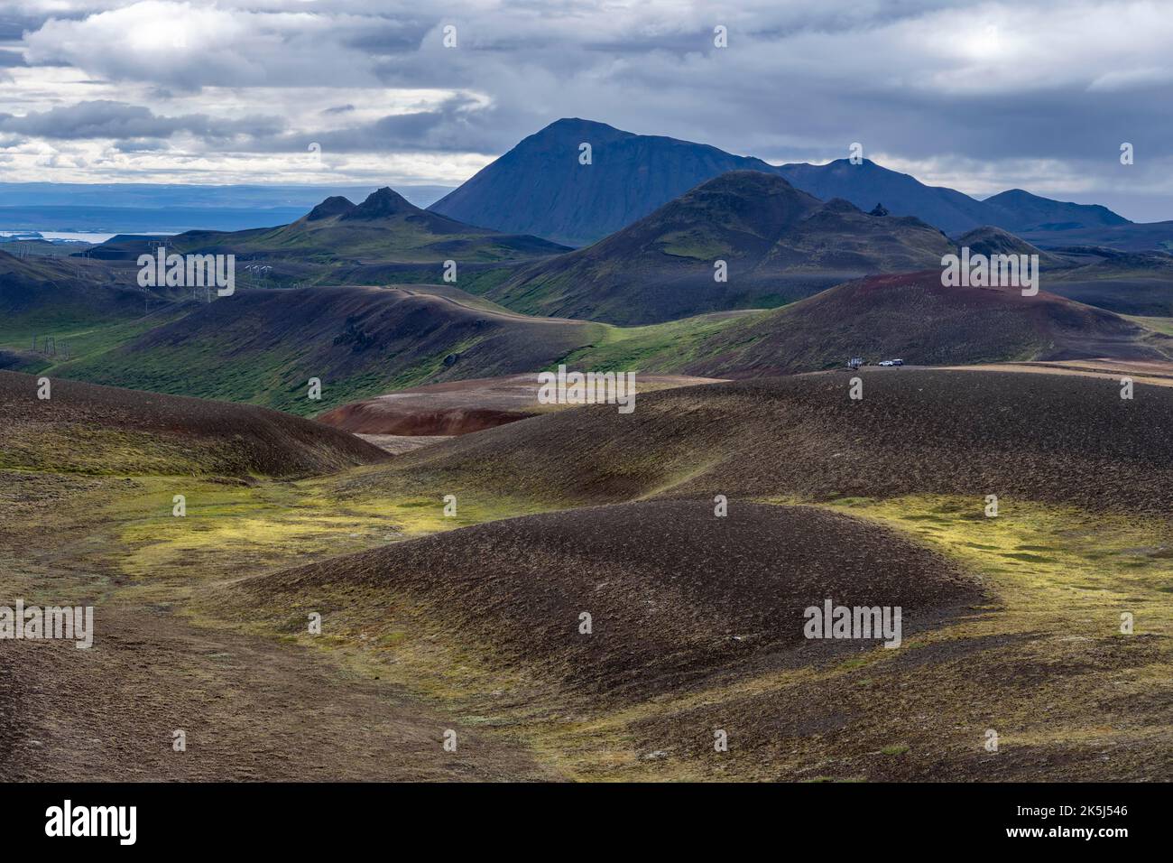 Volcanic landscape with colourful hills, Krafla geothermal area ...