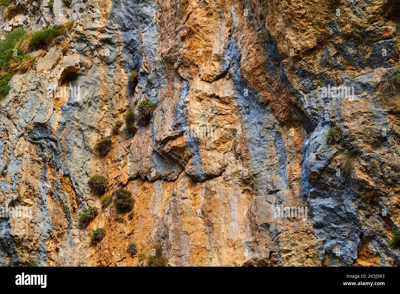 Rock face, detail, grey and ochre vertical rock stripes, Samaria Gorge ...