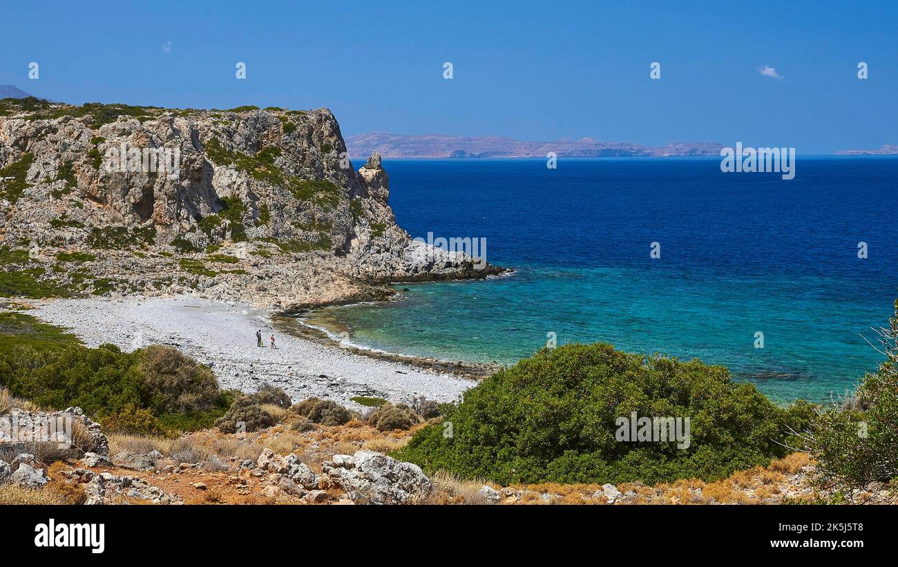 Agios Pavlos beach, pebble beach, barren rocks, trees, blue sea, green sea, Gramvoussa peninsula ...