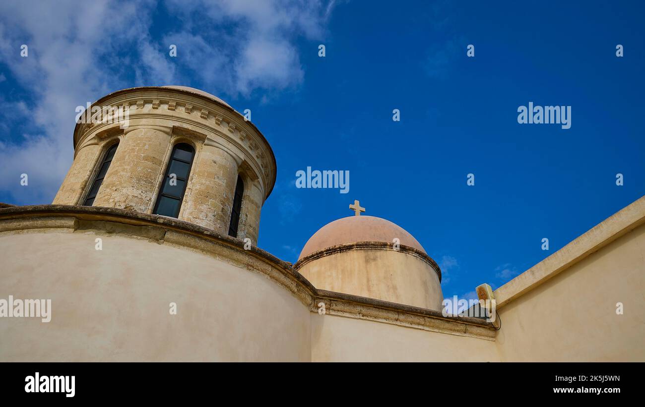 Tower with cross, round tower, ochre building, wide angle, blue sky ...