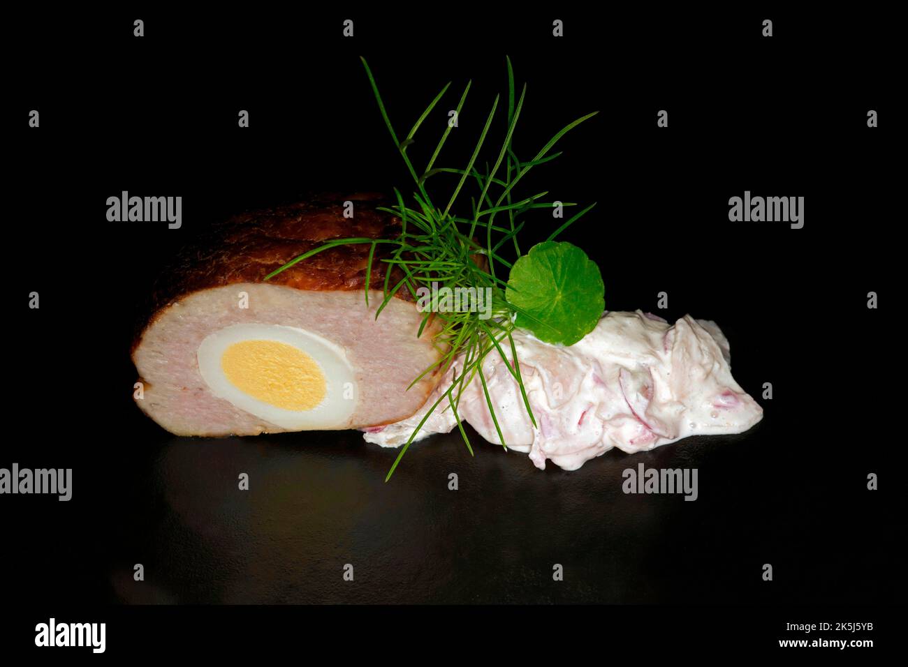 False hare, meat loaf stuffed with an egg and radish salad, food ...