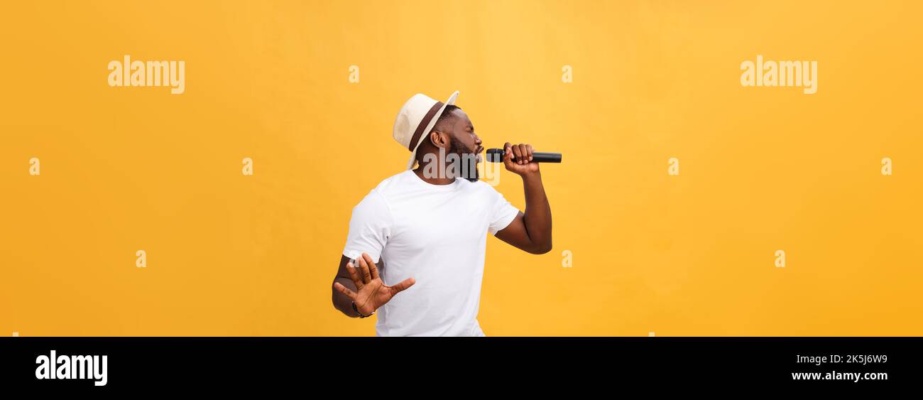 Young teenage black African American boy singer performing at a concert ...