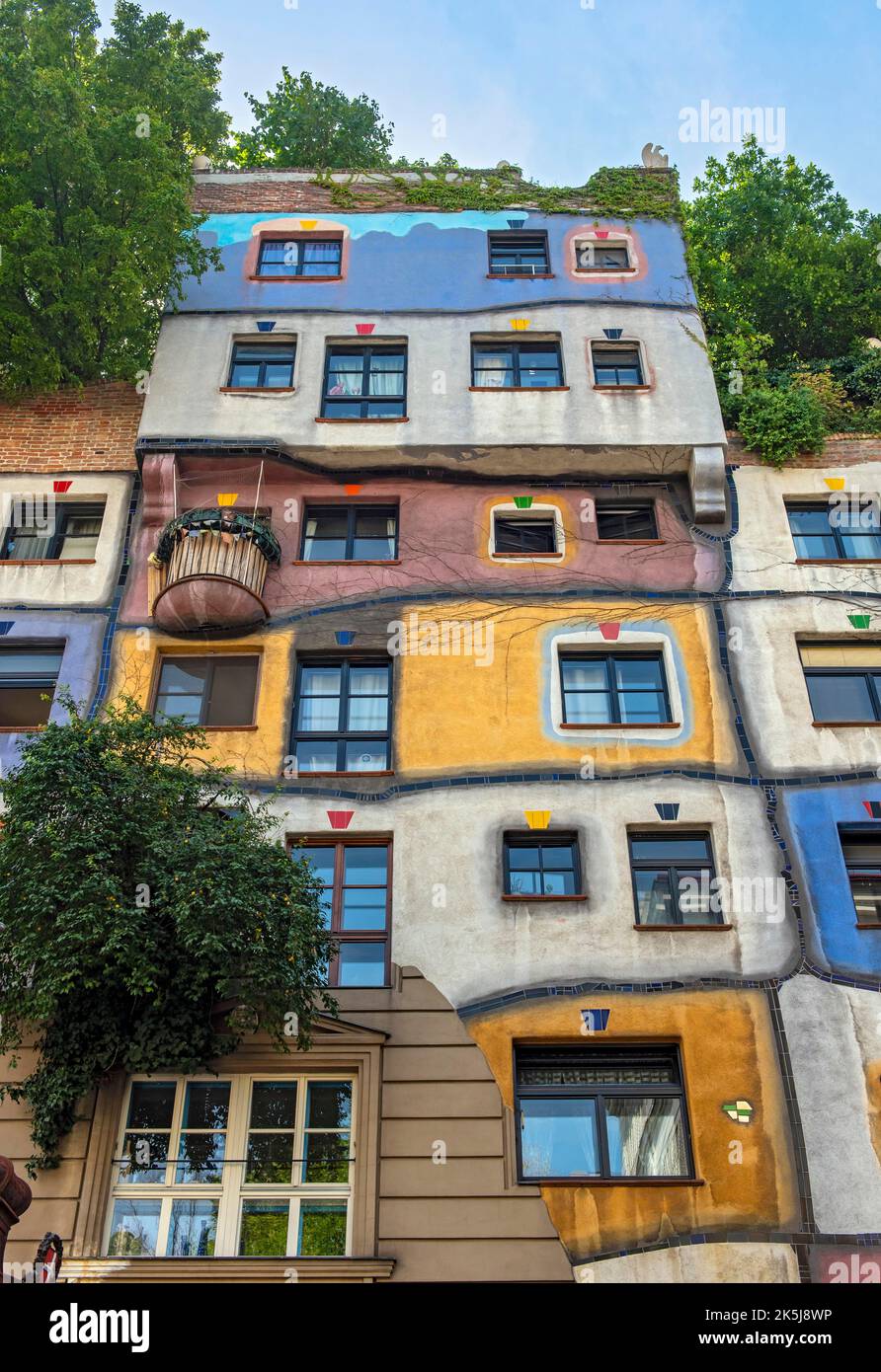 Colorful Facade of Hundertwasserhaus, apartment house designed by Friedensreich Hundertwasser in ...