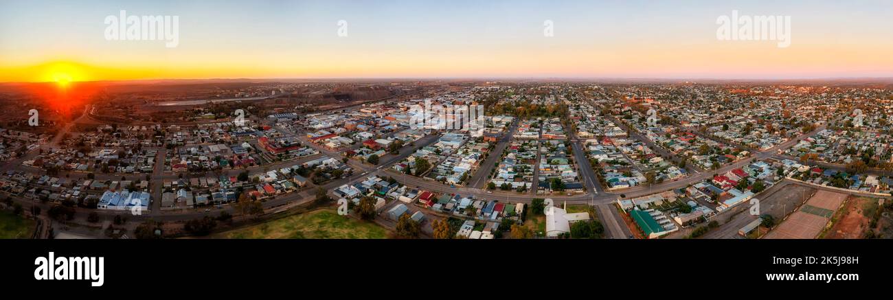 Wide mid-air sunrise panorama over Broken hill city from sun horizon to ...