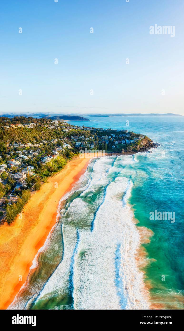 Vertical aerial panorama over Whale beach on Pacific coast of Australia ...