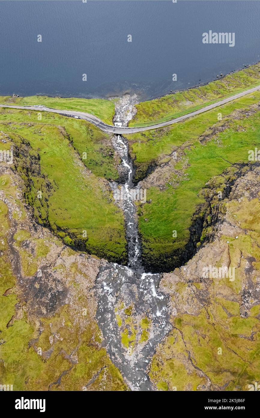 an aerial shot of Fossa Waterfall in the Faroe Islands Stock Photo - Alamy