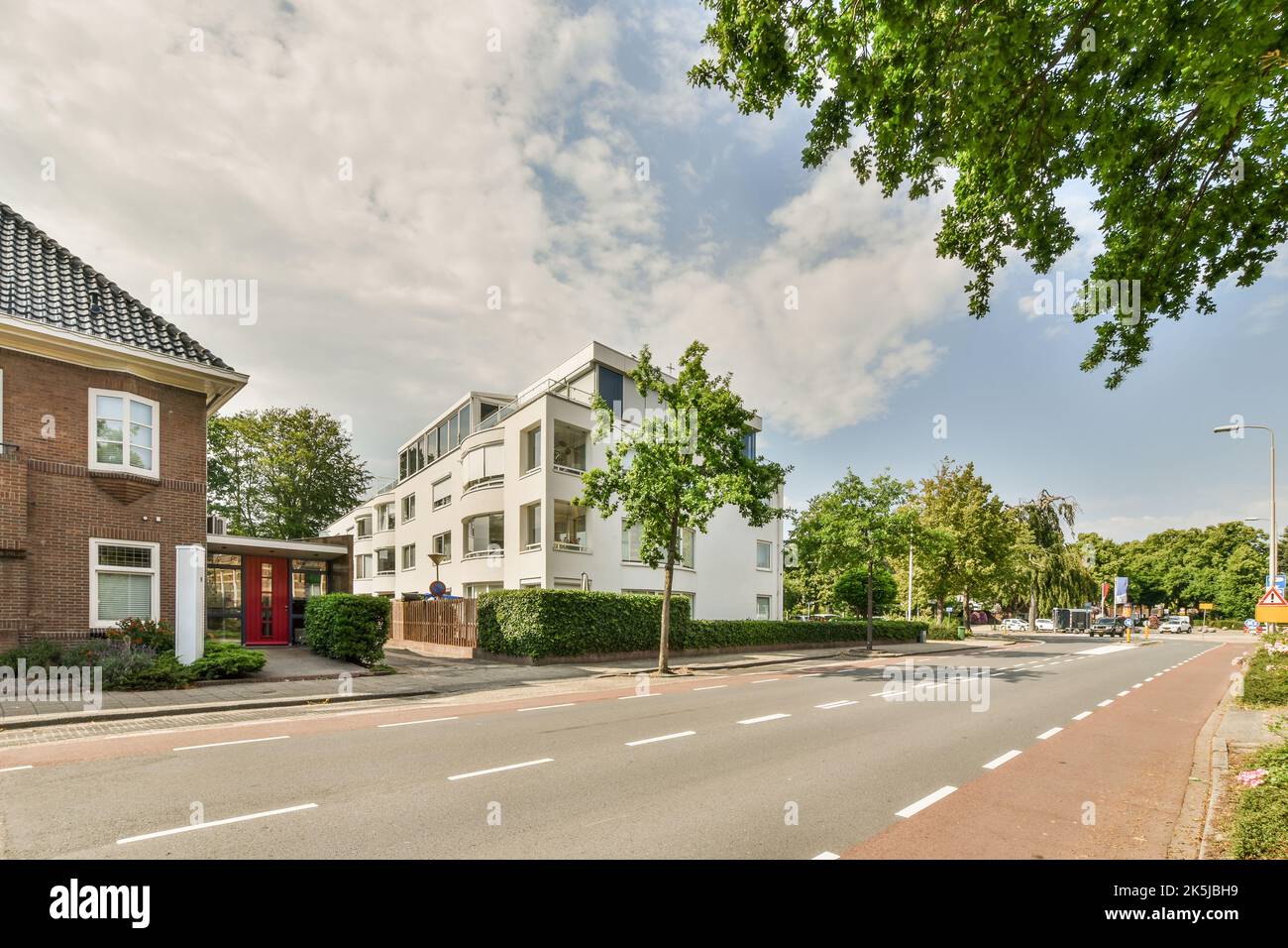 View of street near building with beauty of vegetation outside Stock ...