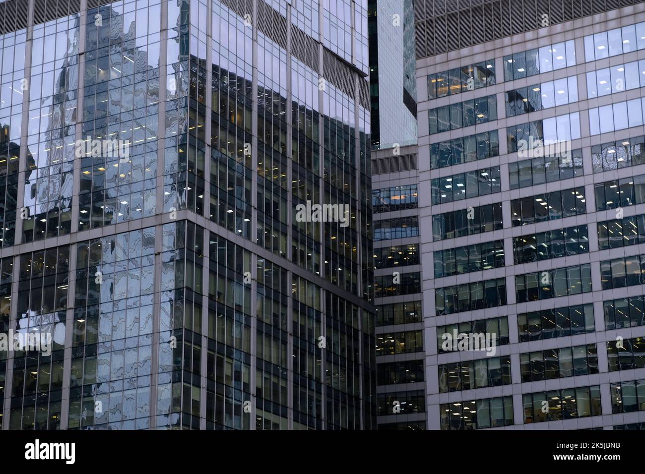 Facade of modern high-rise building with glass windows. Texture of ...