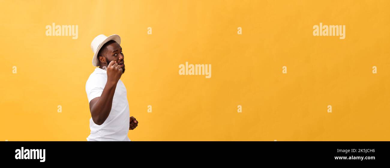 Handsome young Afro-American man employee feeling excited, gesturing ...