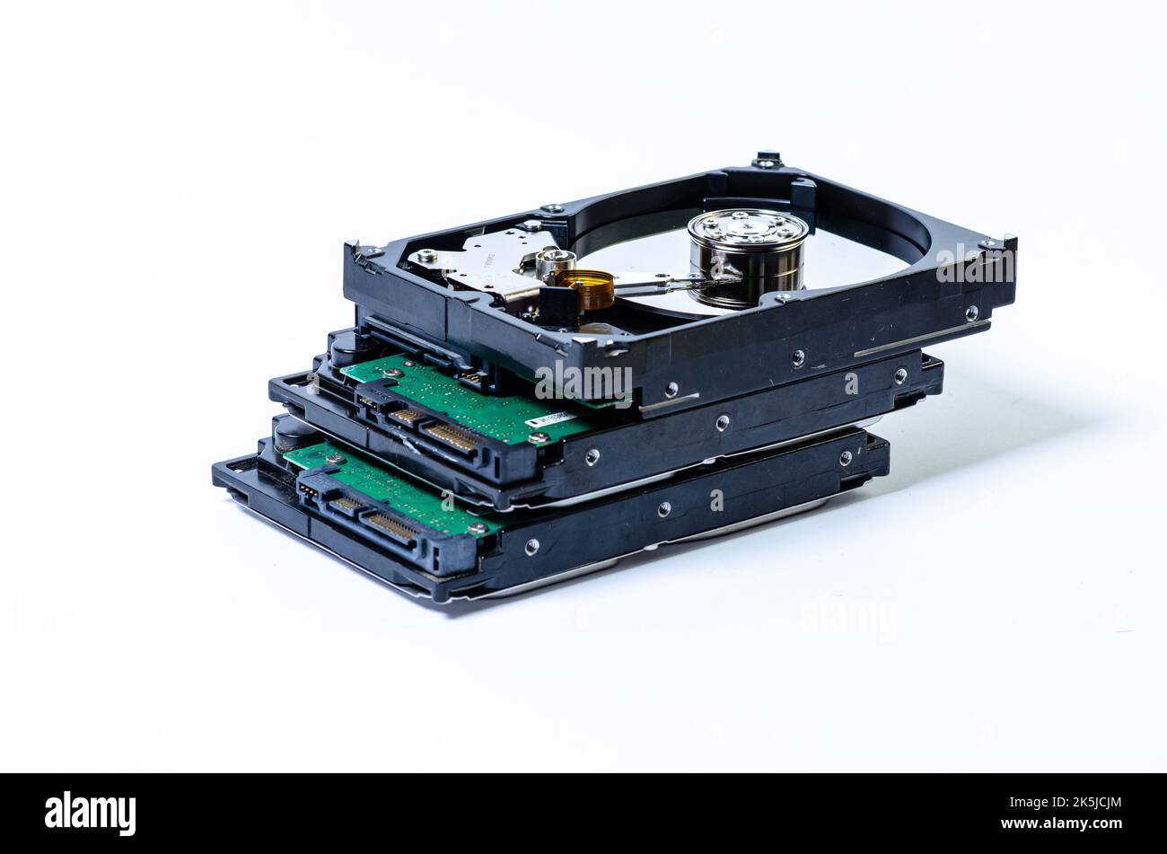 Hard disk drive HDD of different size isolated on white. Detailed view ...
