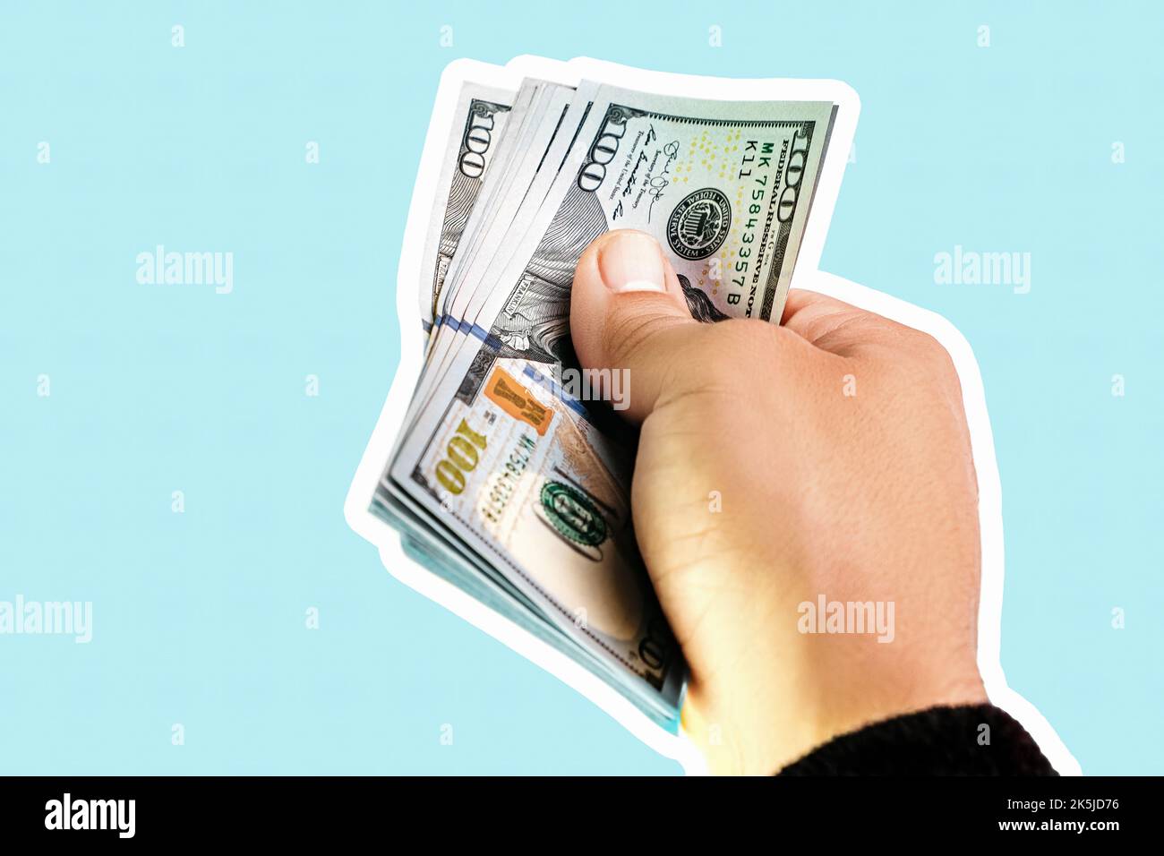 Hand holding american dollars, close up collage on blue background ...