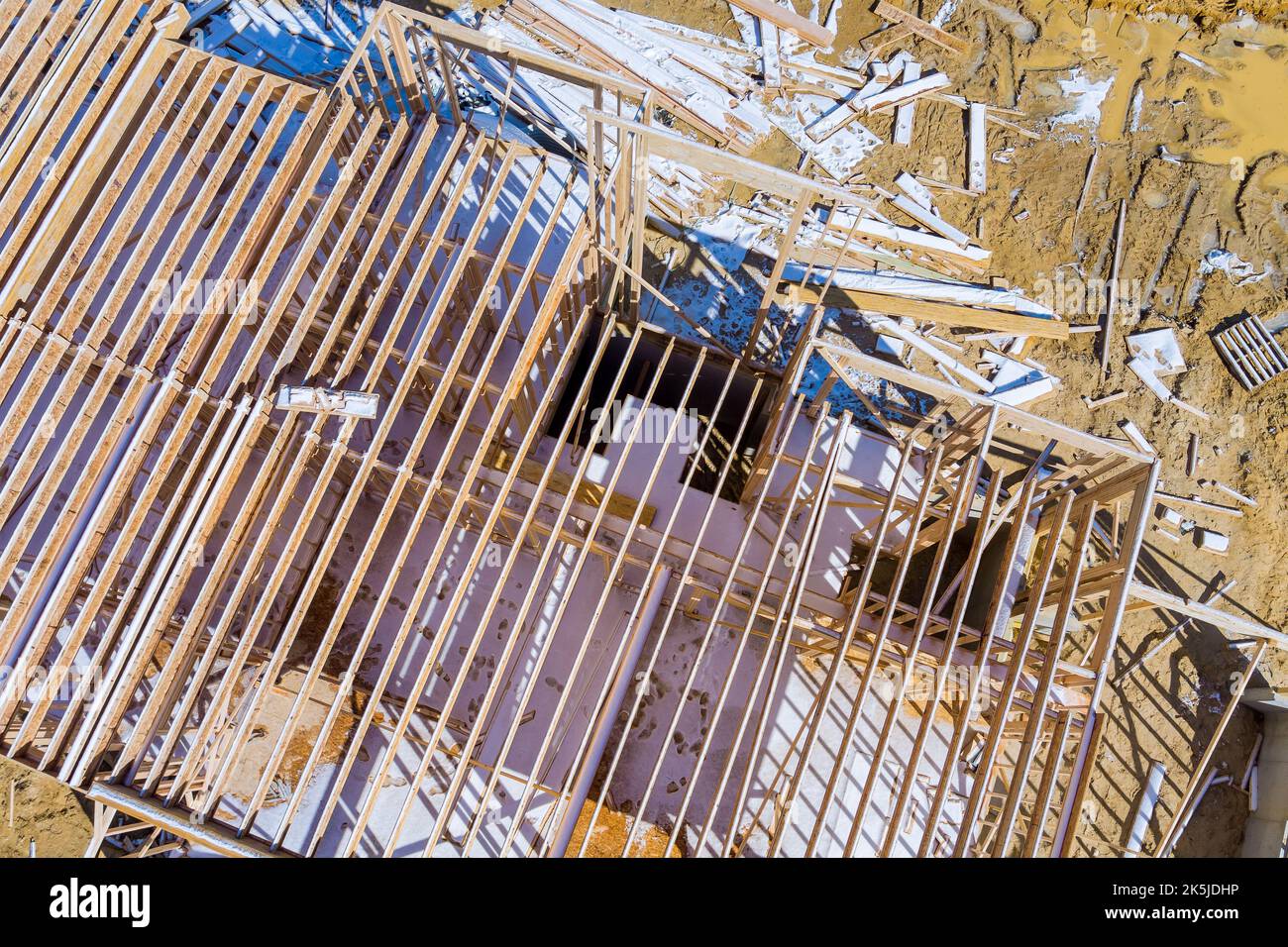 On construction site new residential development, newly framed beams ...