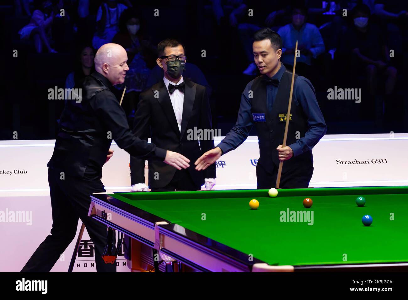 Marco Fu and John Higgins seen during the semi-final match on Day 3 of ...