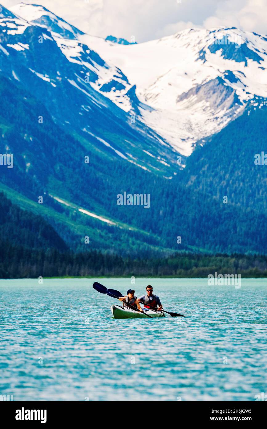 Colorful kayakers; Chilkoot Lake; Chilkoot State Recreation Site; Coast ...