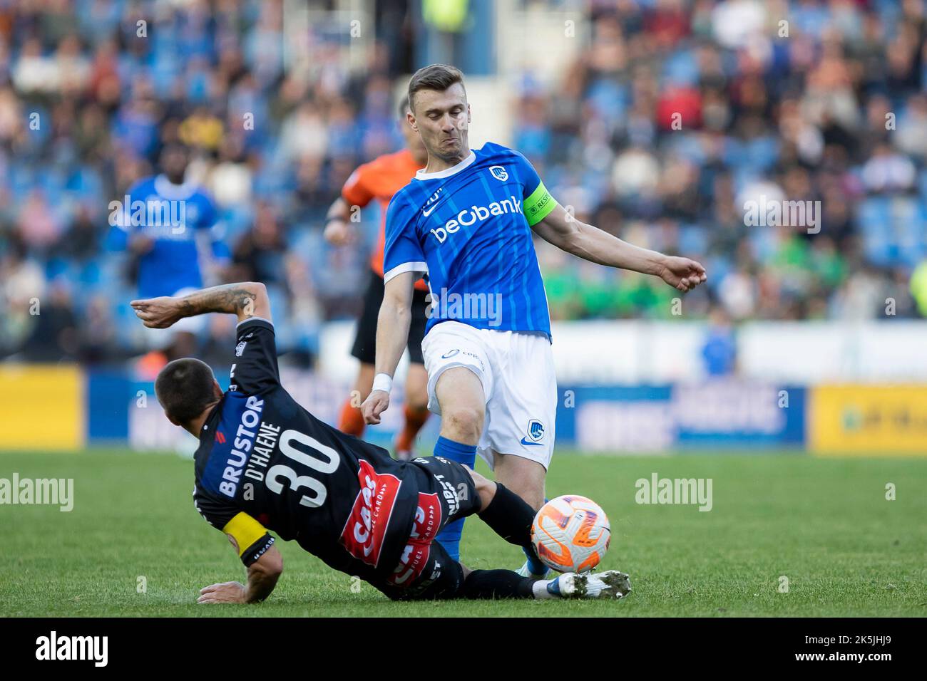 Kortrijk's Kristof D'Haene and Genk's Bryan Heynen fight for the ball ...