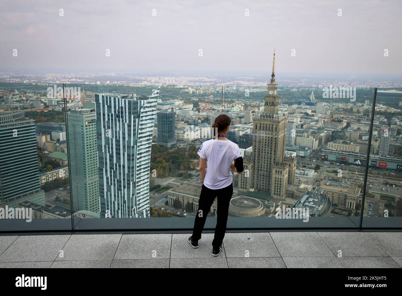 A runner takes in the view from the terrace of the Varso tower in ...